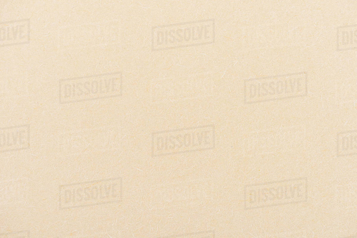Texture of beige color paper as background - Stock Photo - Dissolve