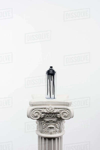 Close up view of spray paint in can standing on column isolated on ...