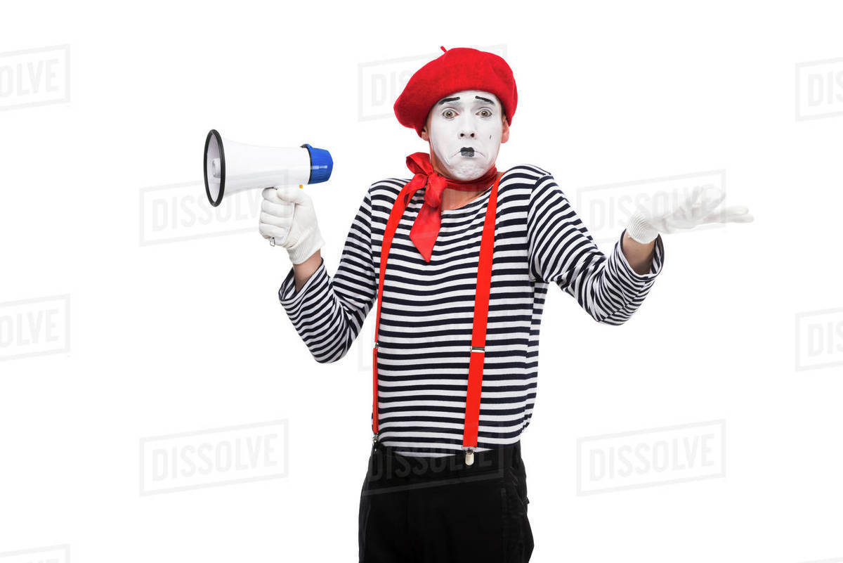 Confused mime holding loudspeaker and showing shrug gesture isolated on ...
