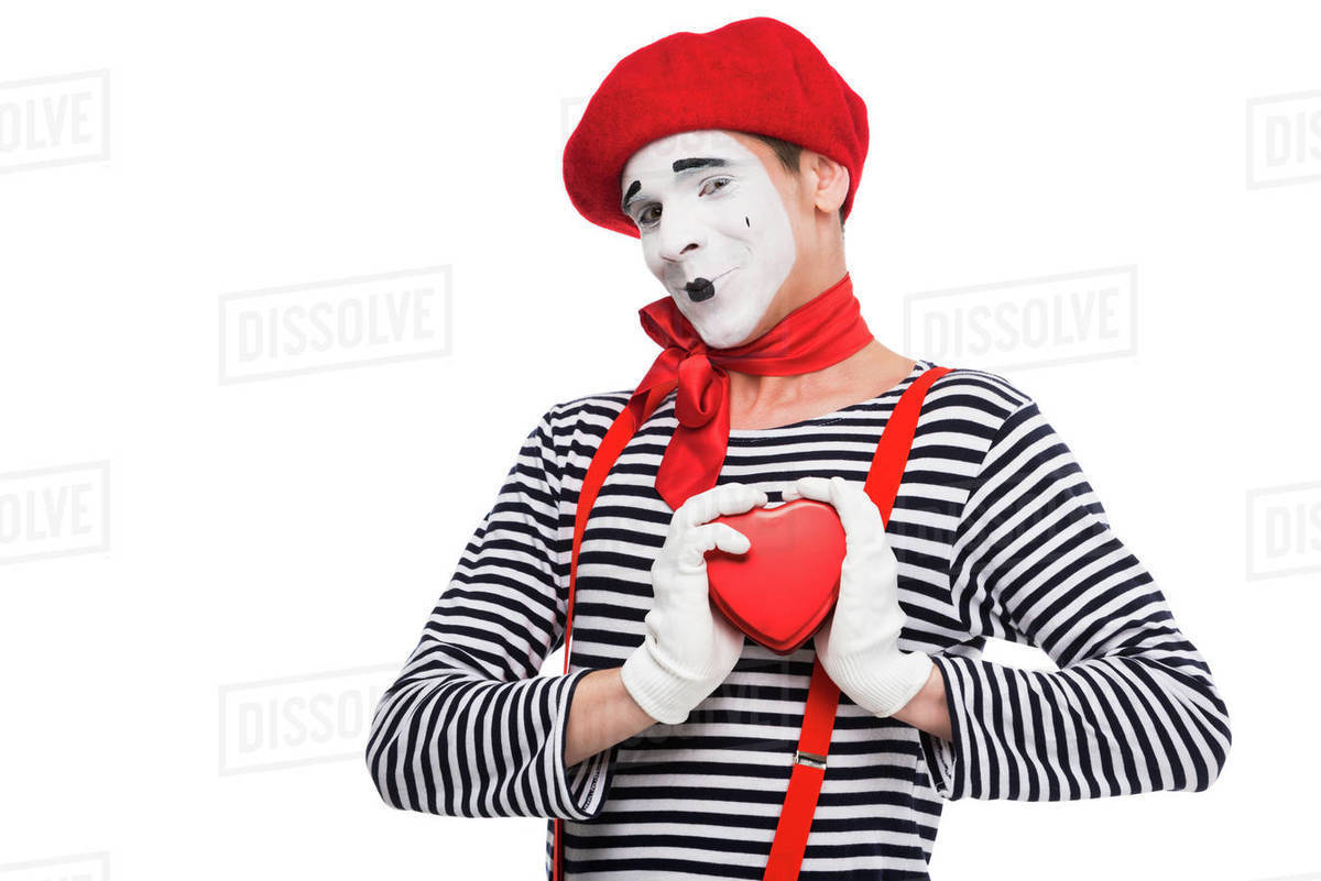 Happy mime hugging heart shaped gift box isolated on white, st ...