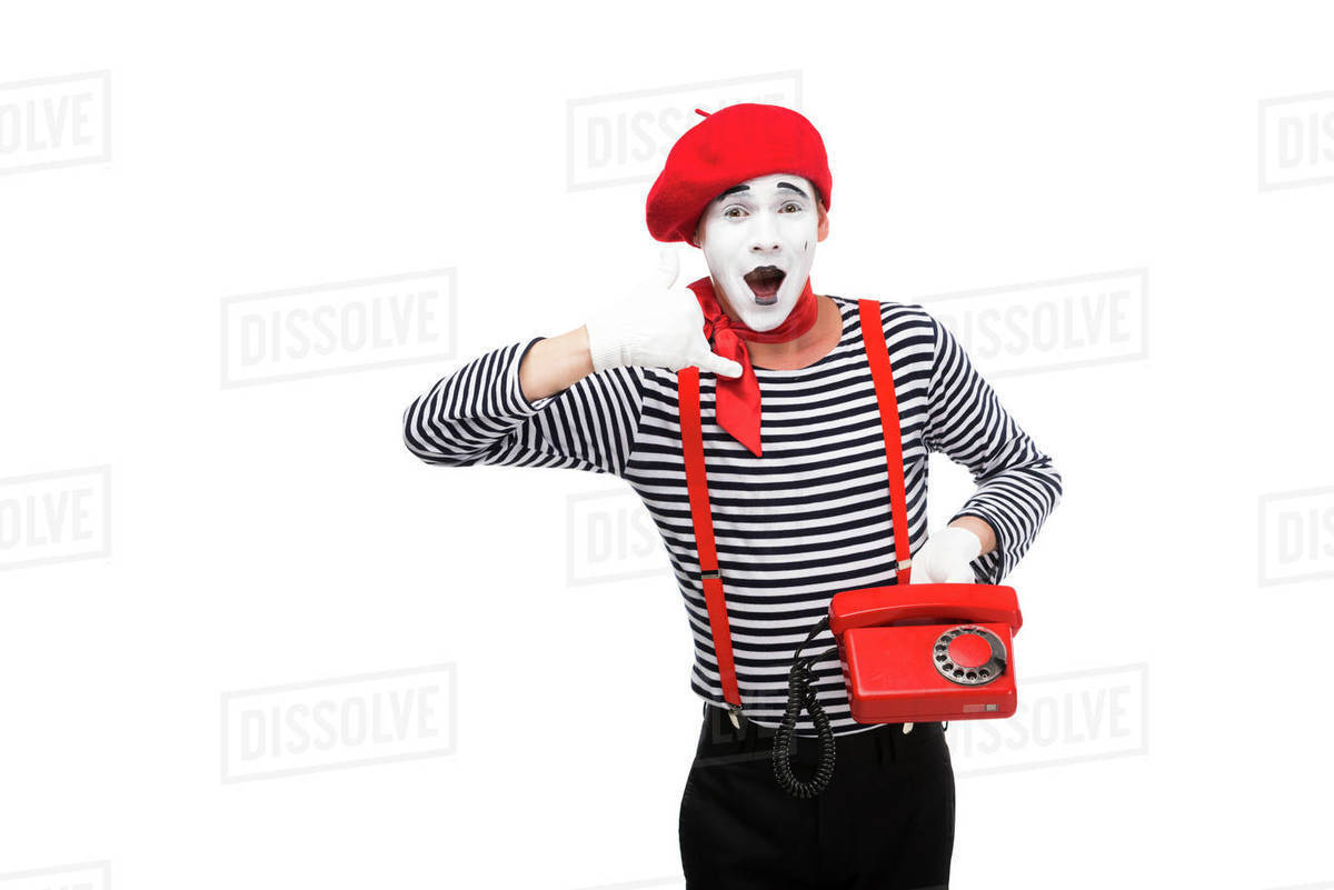 Mime holding red telephone and showing call me sign isolated on white ...