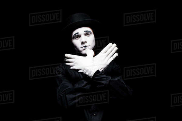 Mime showing bird with hands isolated on black - Royalty-free Stock ...