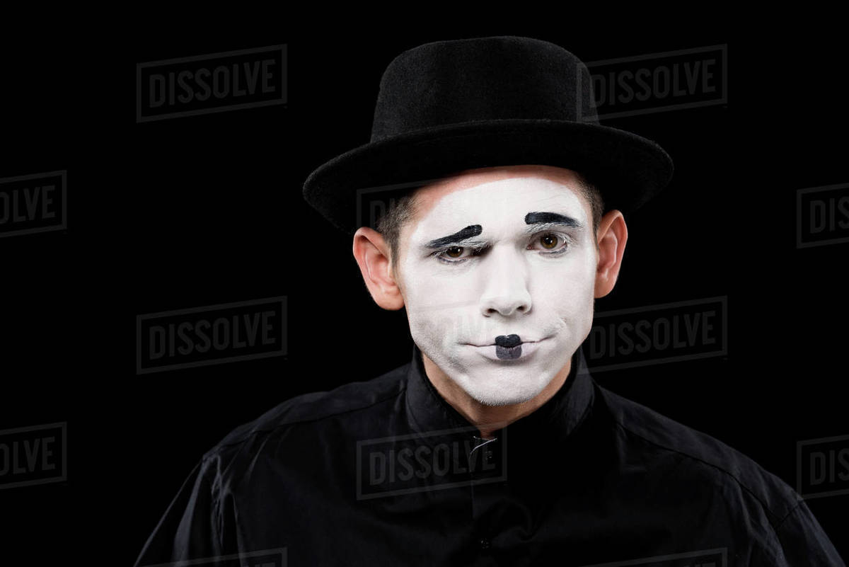 Confused mime looking at camera isolated on black - Royalty-free Stock ...