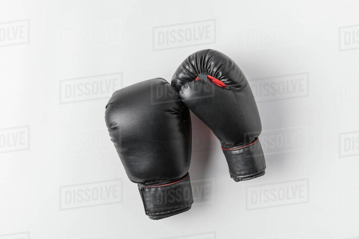 top view of boxing gloves on white tabletop - Royalty-free Stock Photo ...