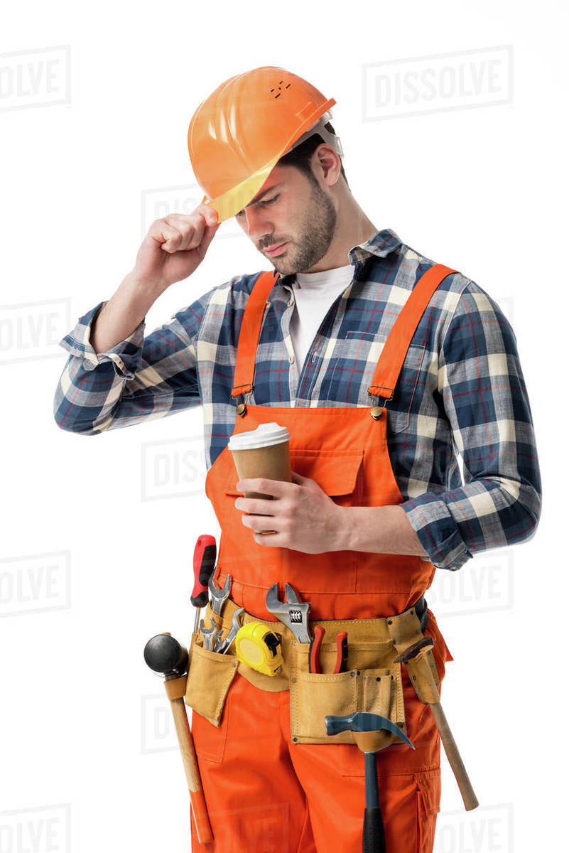 Repairman in orange overall and helmet holding coffee cup isolated on ...