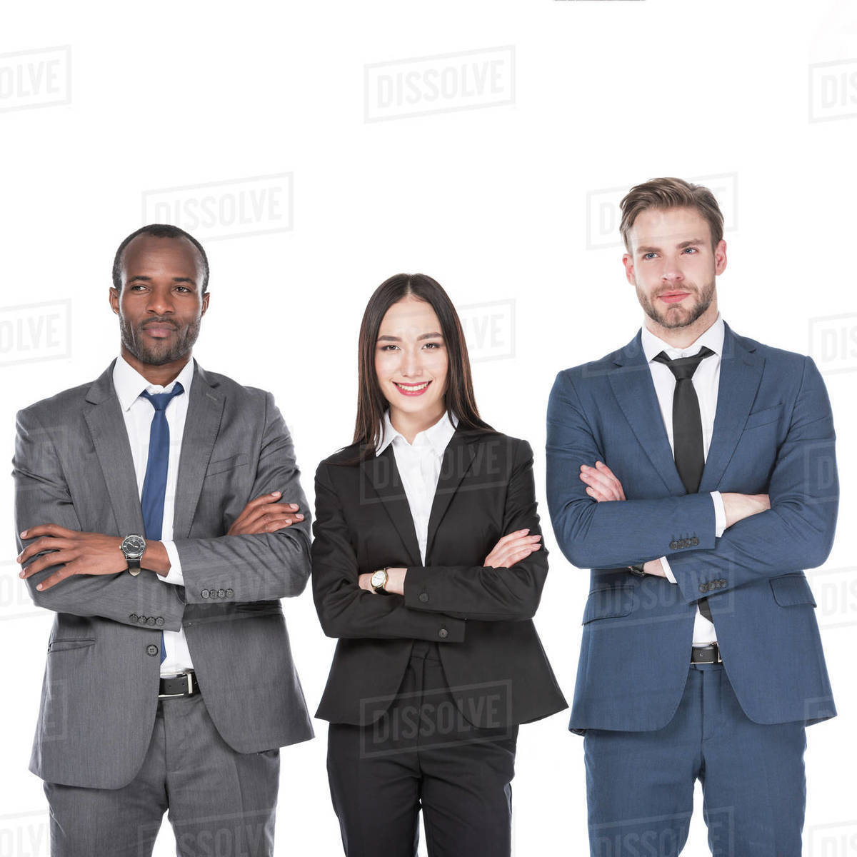 Portrait of smiling multicultural young business people with arms ...