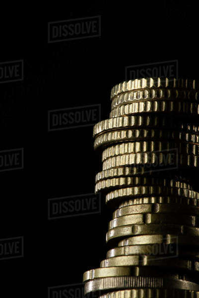 Close up view of pile of coins isolated on black - Royalty-free Stock ...
