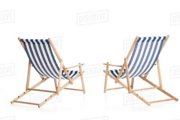 Rear view of two beach chairs, isolated on white - Royalty-free Stock ...