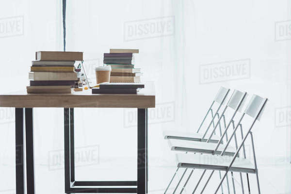 Interior of room with chairs and table with books - Royalty-free Stock ...
