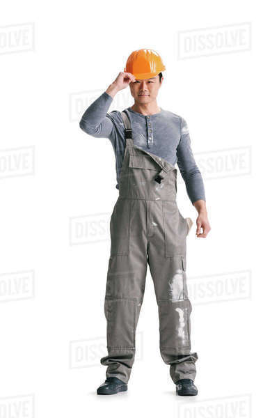 Asian construction worker in overall and helmet isolated on white ...