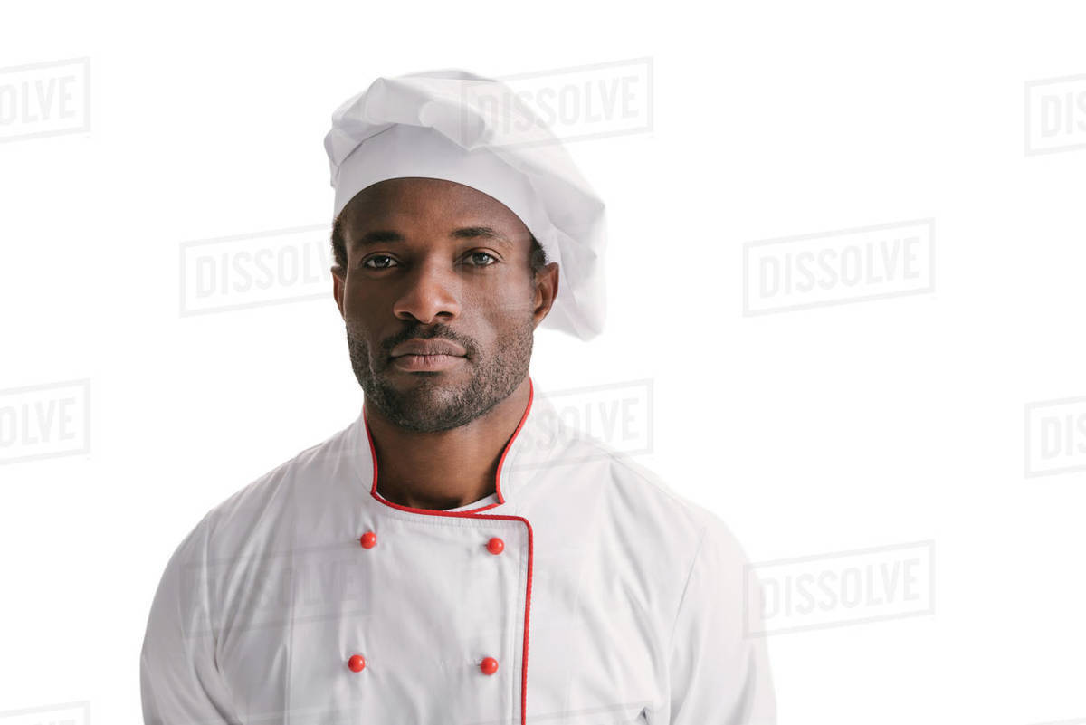 Handsome pensive african-american chef isolated on white - Royalty-free ...