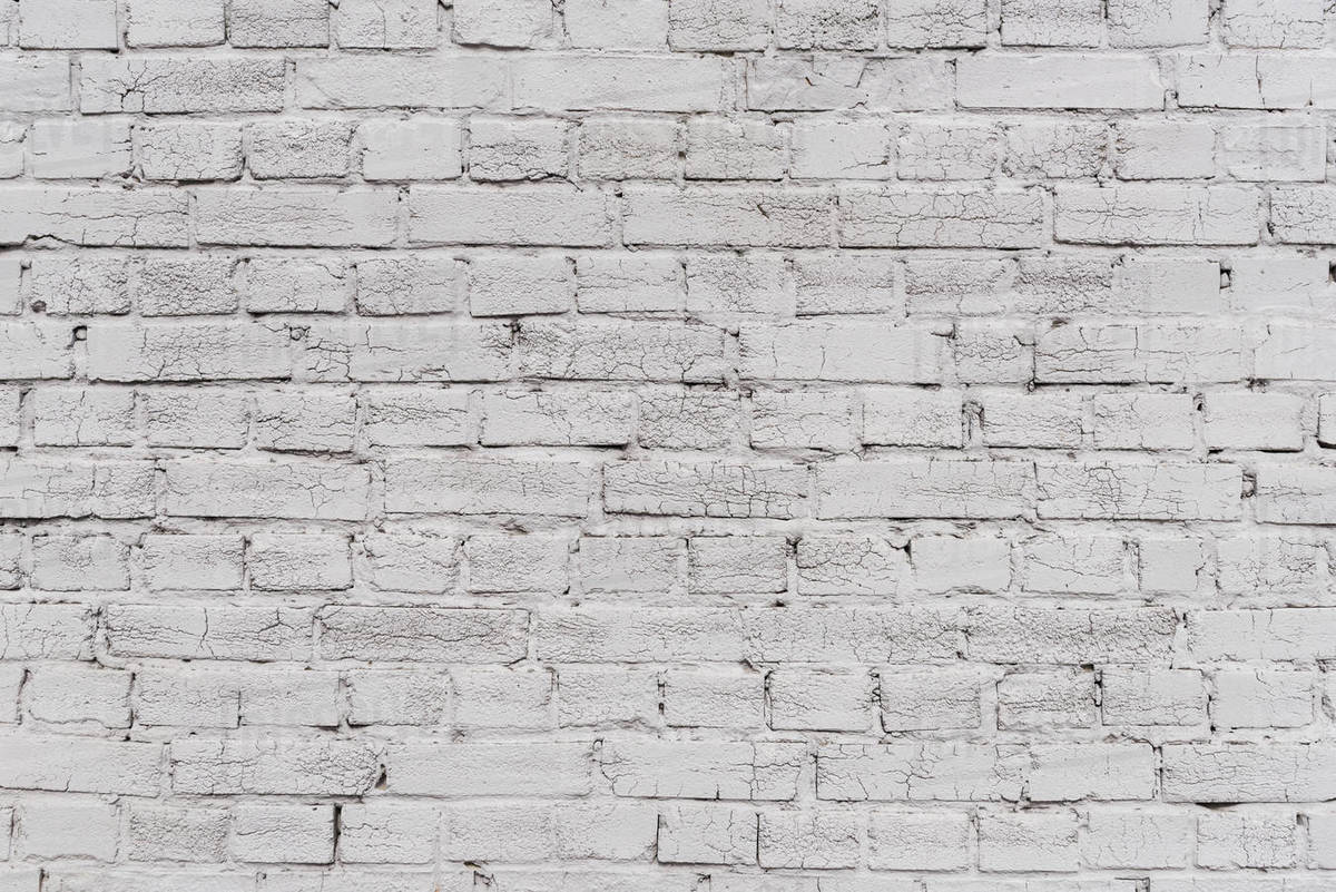 Building wall with old bricks background - Stock Photo - Dissolve
