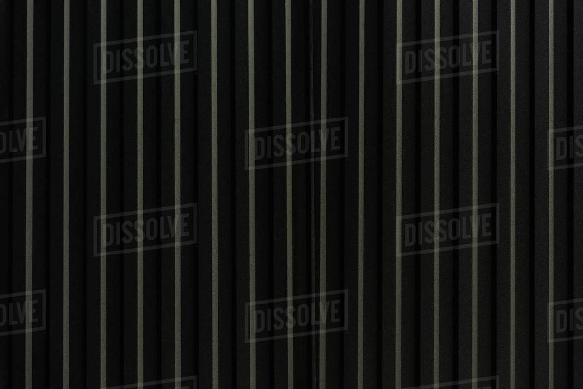 Black wall panel industrial background - Stock Photo - Dissolve