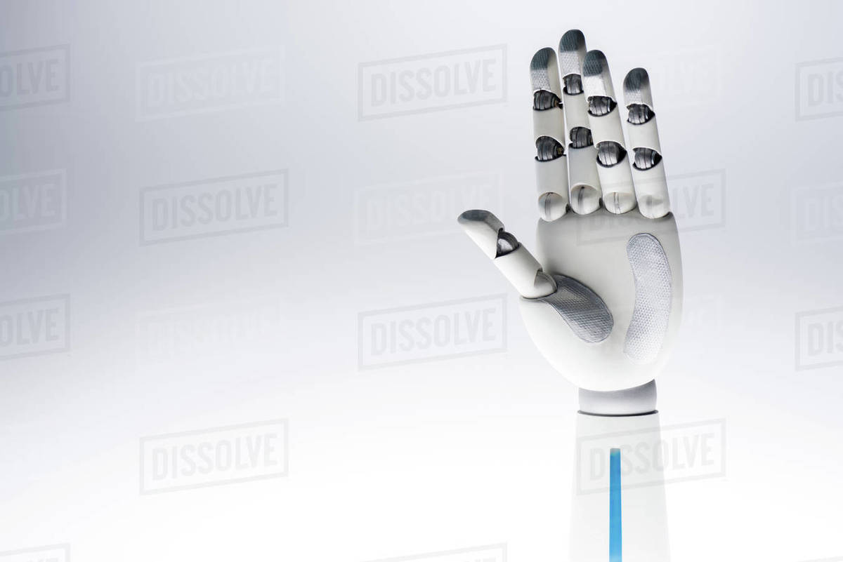 Robot waving hand isolated on grey - Royalty-free Stock Photo | Dissolve