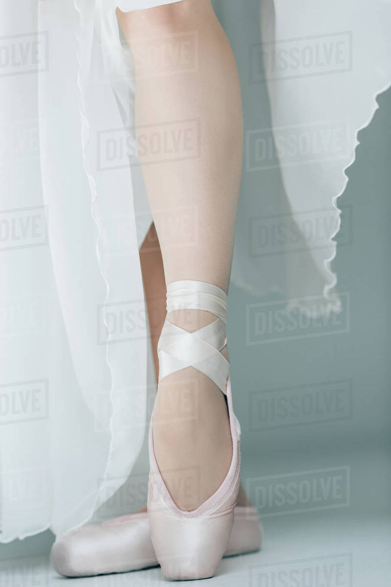 Cropped view of feet in ballet shoes - Royalty-free Stock Photo | Dissolve