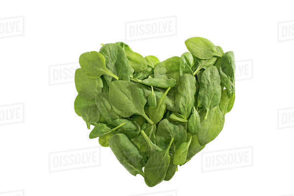 Top view of heart shaped green spinach leaves isolated on white, food ...