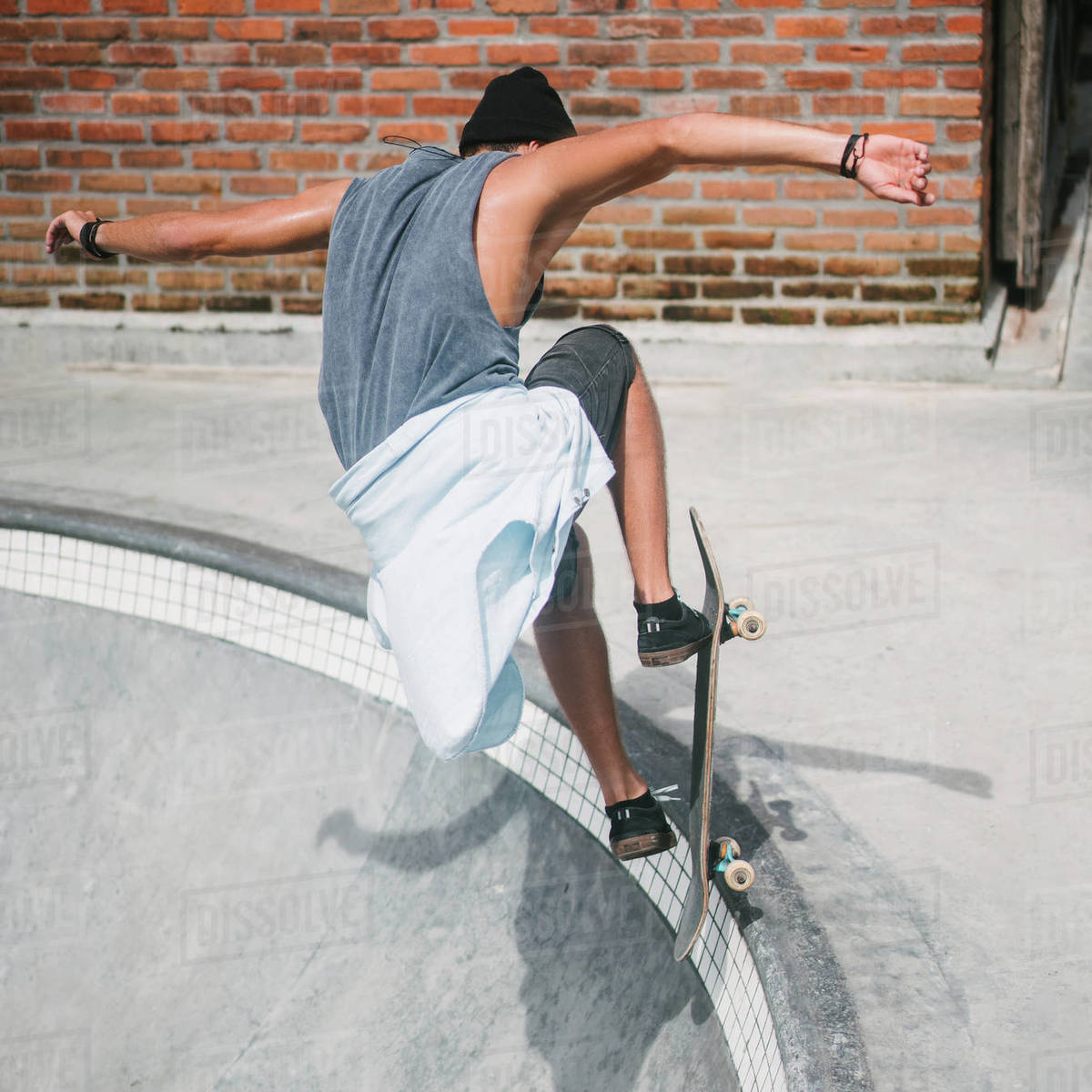 Back view of skater jumping with longboard - Royalty-free Stock Photo ...