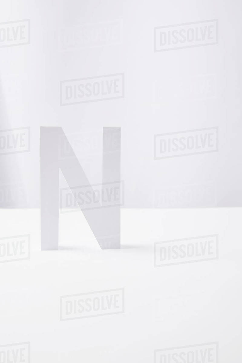 Letter N made of paper, on white background with copy space - Stock ...