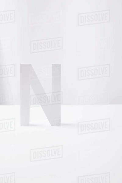 Letter N made of paper, on white background with copy space - Stock ...