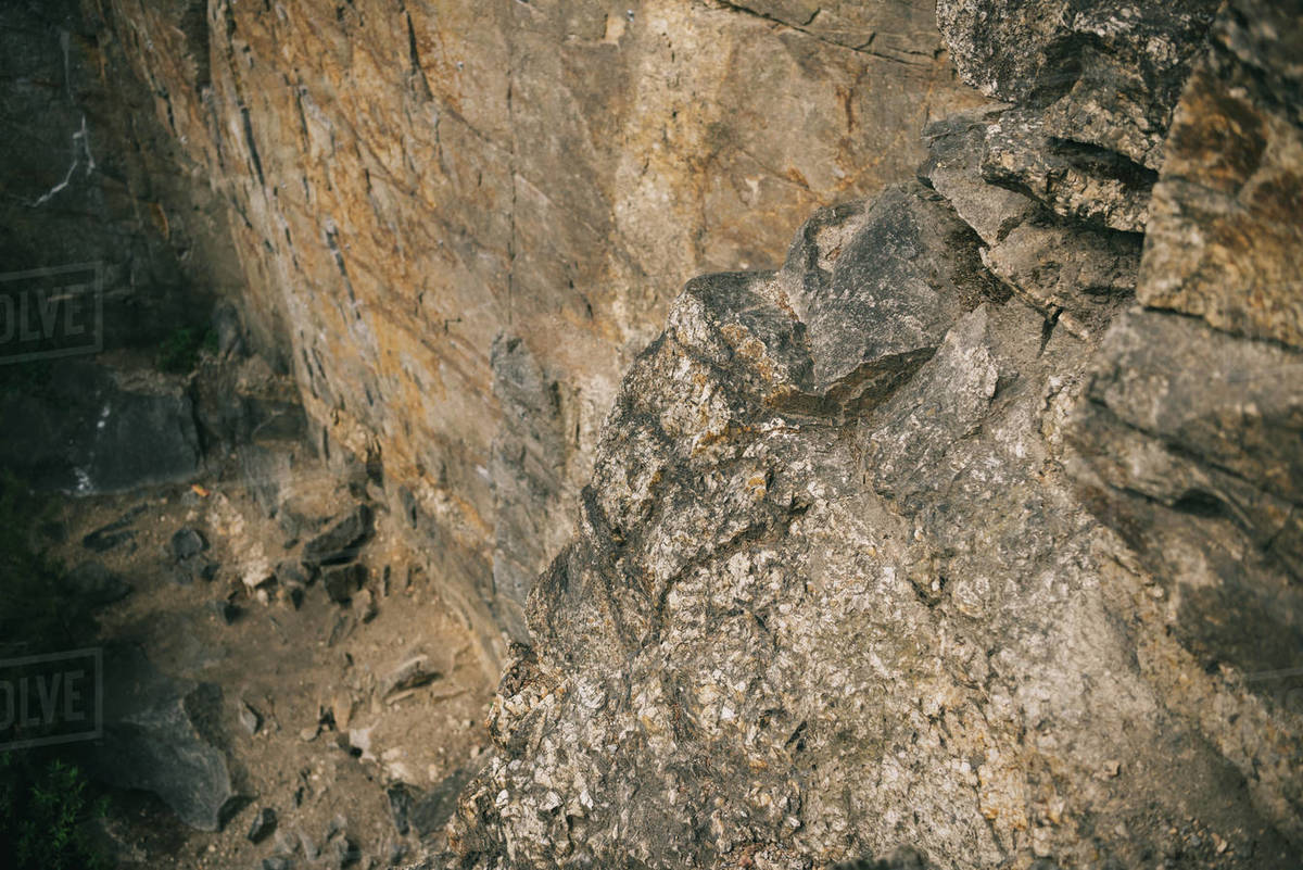 Elevated view from rocky cliff on abyss - Royalty-free Stock Photo ...