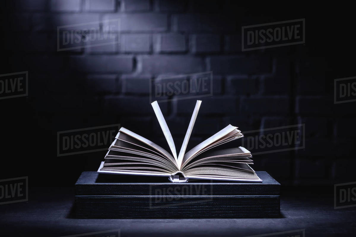 Open book with empty pages on dark tabletop - Royalty-free Stock Photo ...