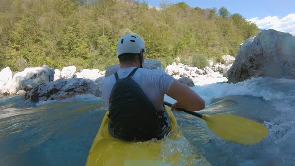Two friends kayaking through rapids in slow motion - Stock Video ...