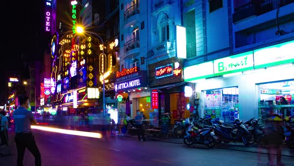 A night timelapse of the neon street at the downtown wide shot - 4K ...