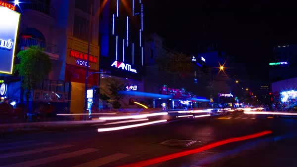 A night timelapse of the neon street at the downtown wide shot - 4K ...