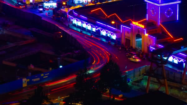 A night timelapse of the neon street at the downtown wide shot - 4K ...