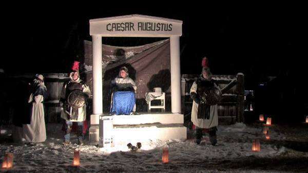 Caesar Augustus and Roman soldiers in a nativity scene in a snow storm ...