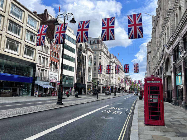 UK flags across The Strand, London, England, UK - Stock Photo - Dissolve