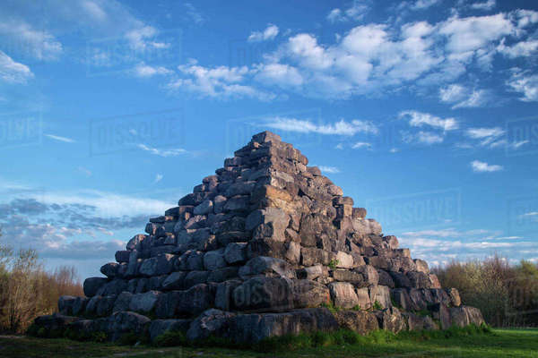 Ireland, County Offaly, Lough Boora Parklands, Pyramid in morning sun ...