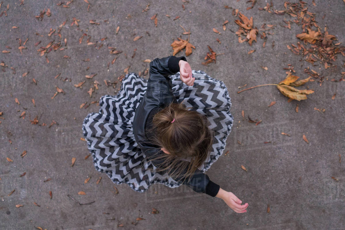 Overhead view of a Girl spinning around - Royalty-free Stock Photo ...