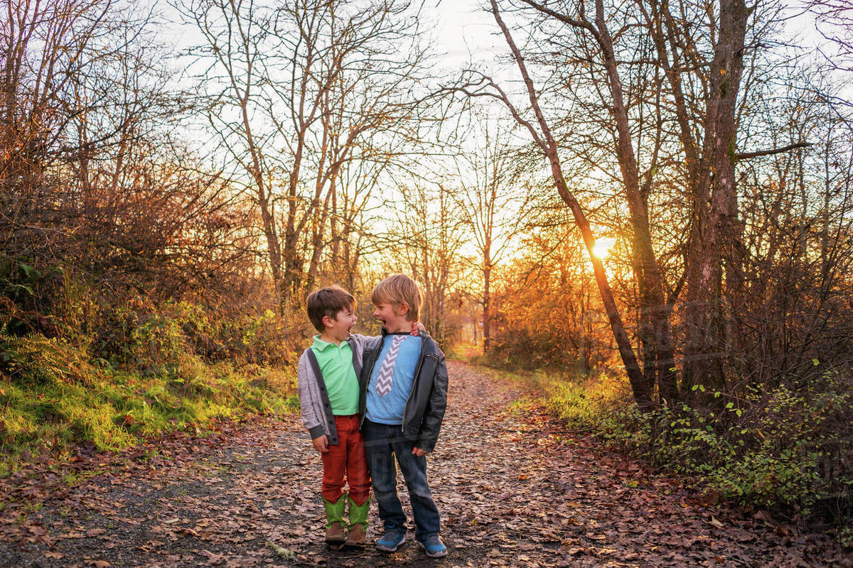 Two boys in the forest looking at each other and screaming - Stock ...