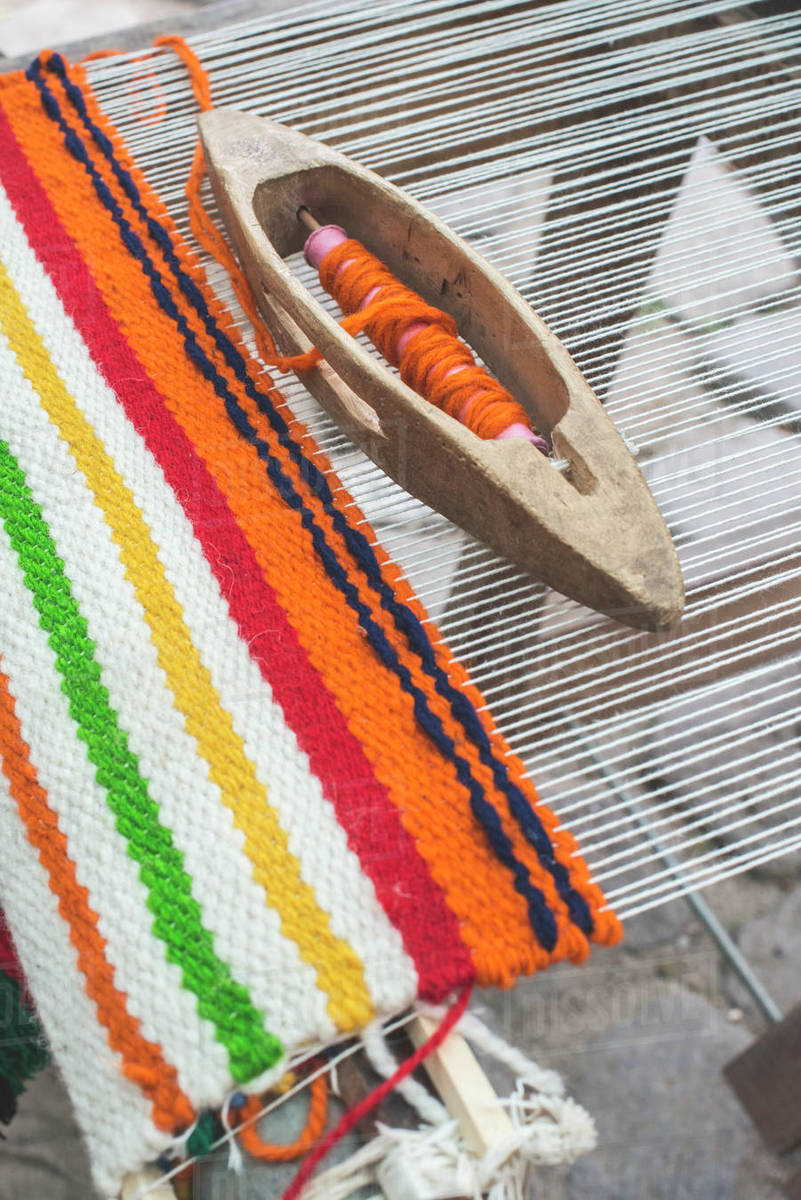 Weaving loom for a carpet - Stock Photo - Dissolve