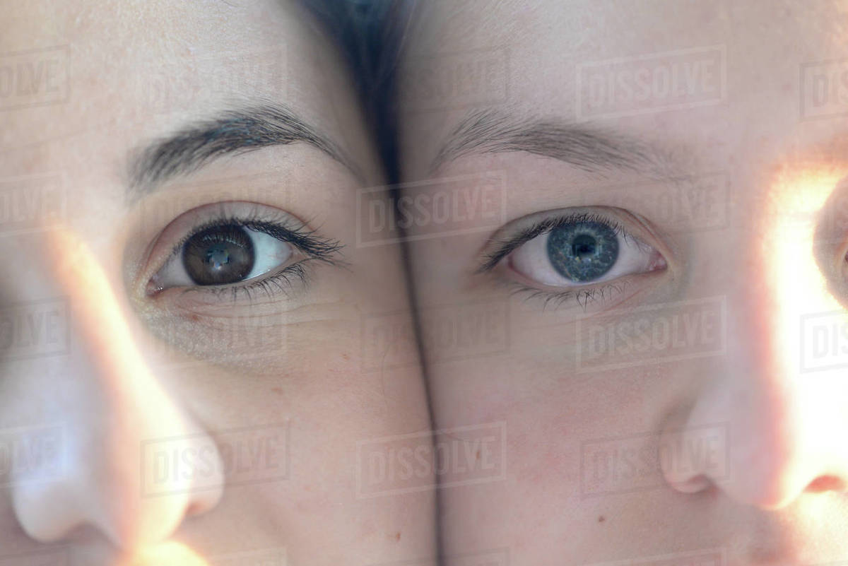 Close-up of woman and girl's faces side by side - Royalty-free Stock ...