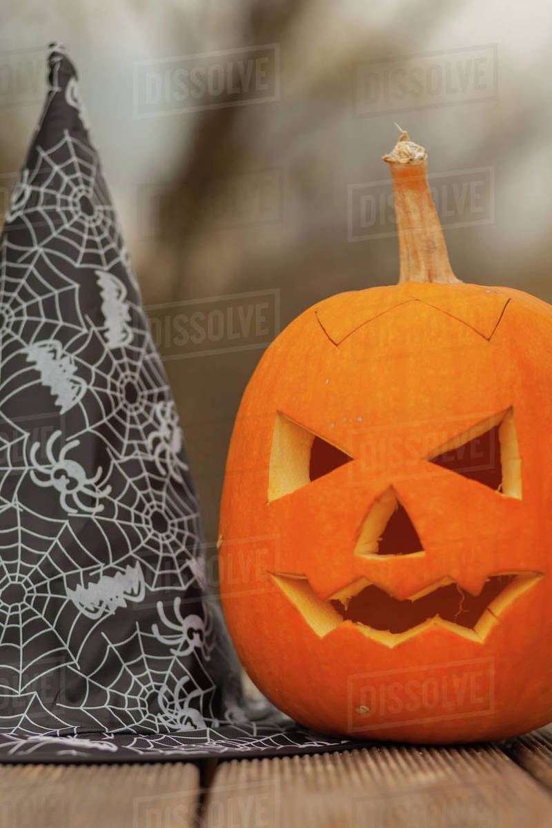 Halloween Jack-o-lantern and a witches hat - Royalty-free Stock Photo ...