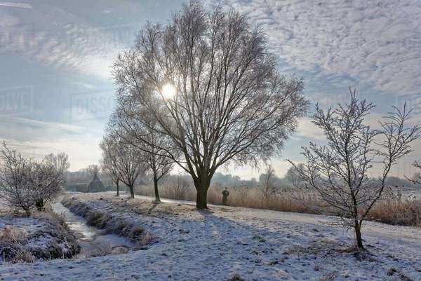 River through winter landscape, Leer, Lower Saxony, Germany - Royalty ...