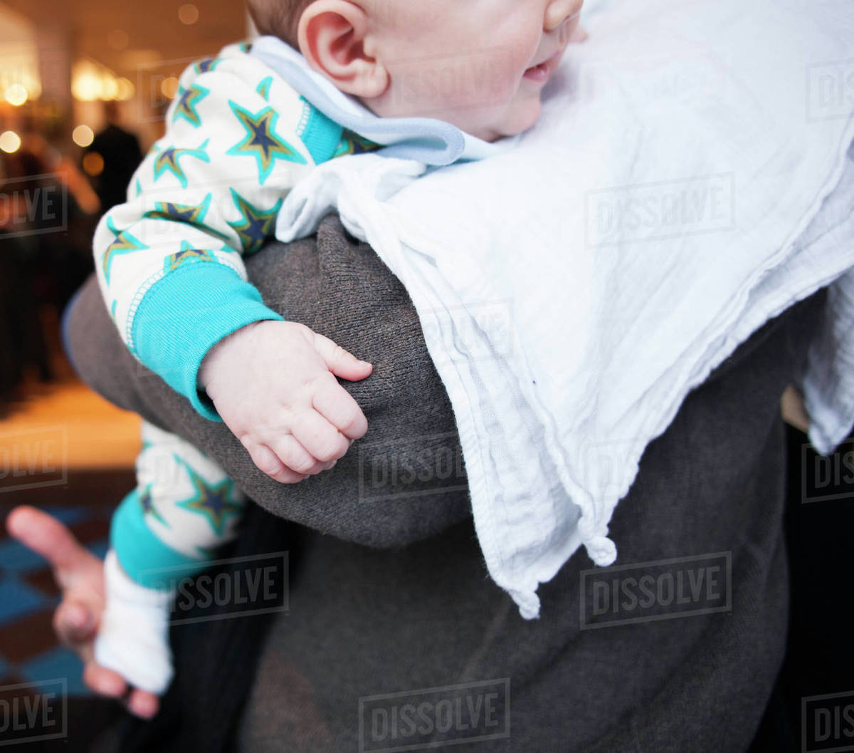 Baby boy On Adults Shoulder - Royalty-free Stock Photo | Dissolve