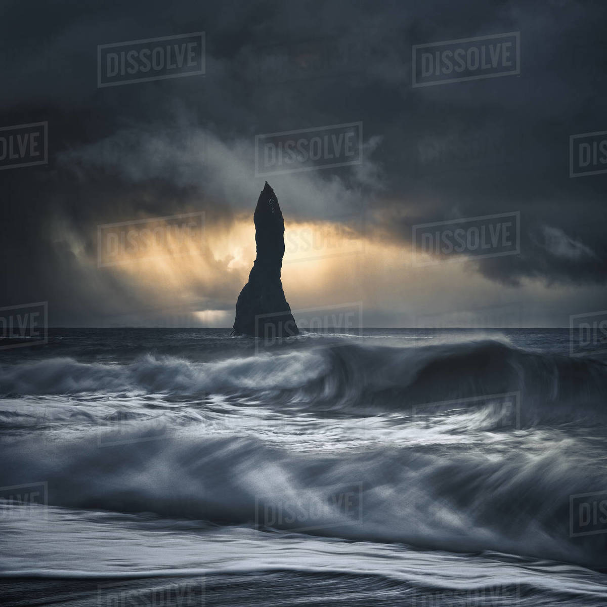 Reynisdrangar basalt sea stacks in ocean, South Central Iceland ...