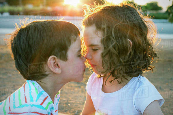 Two children rubbing noses - Stock Photo - Dissolve