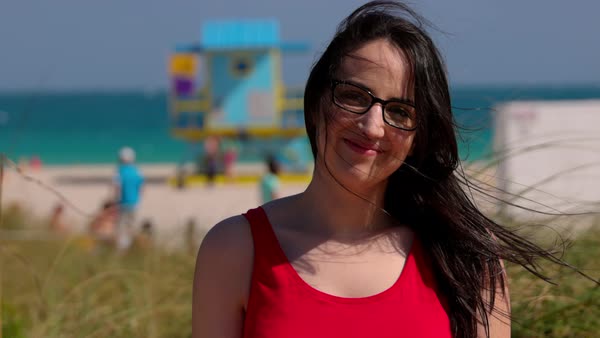 Pretty woman at Miami Beach enjoying the summer vacation - 4K Royalty ...