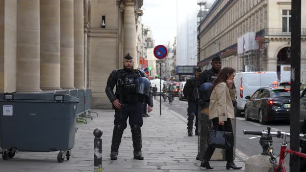 Paris, France - 3 May 2023. Front view of Caucasian and African heavily ...