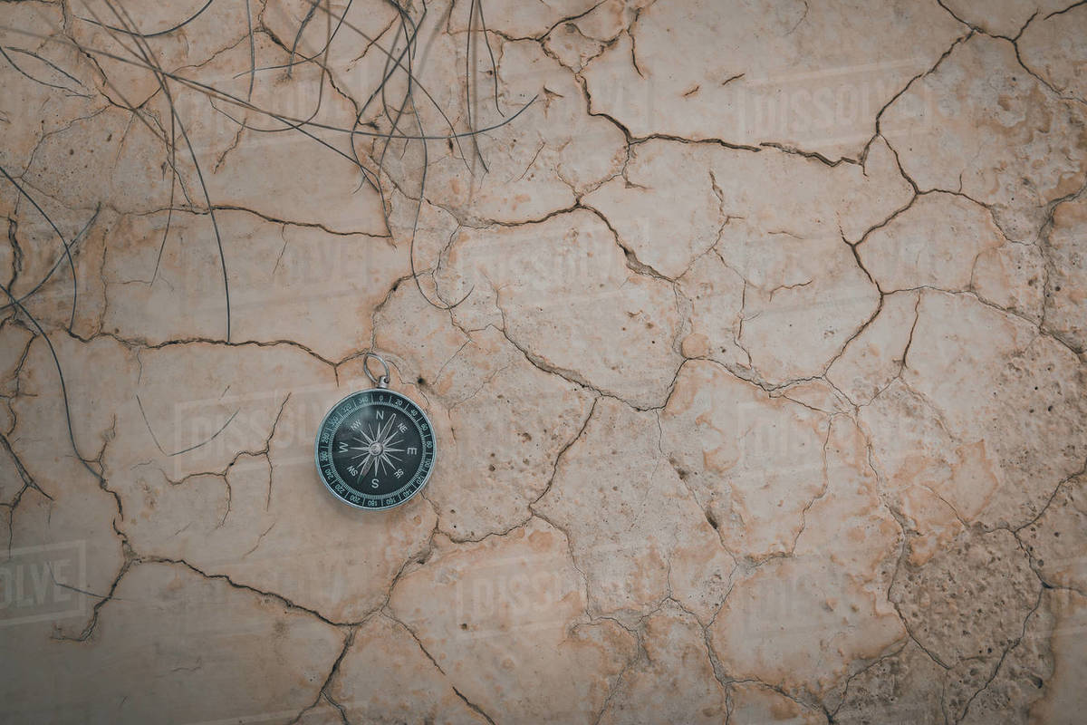Big compass on dry cracked desert area - Royalty-free Stock Photo ...