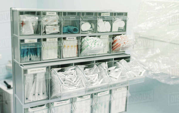 Chest of drawers with sterile syringes, bandages, utensils and ...