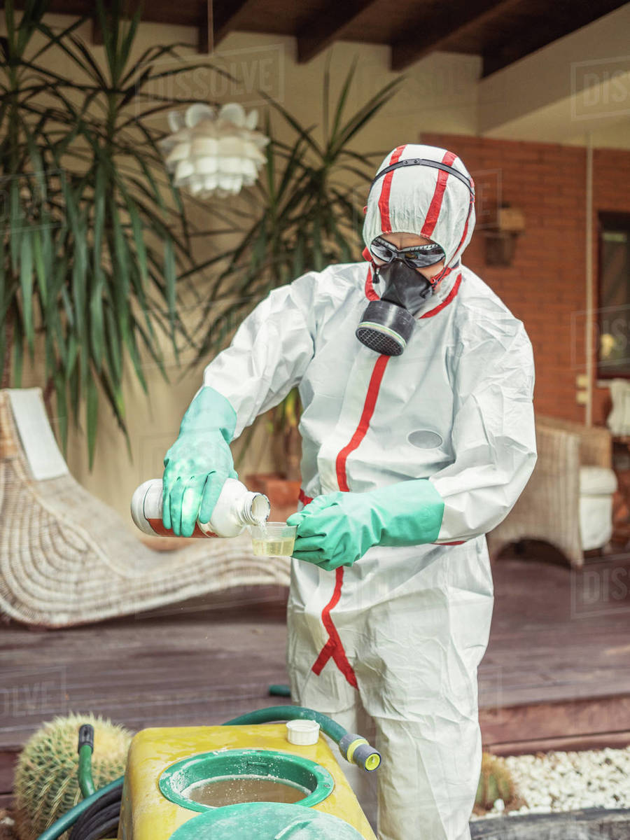 Knowledgeable fumigator professional in uniform for fumigation ...