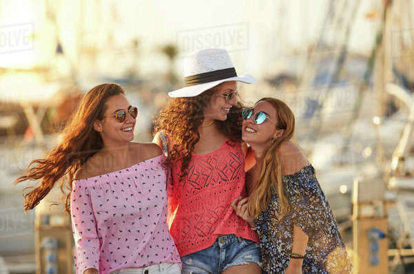 Happy fellows hugging on yacht parking - Royalty-free Stock Photo ...
