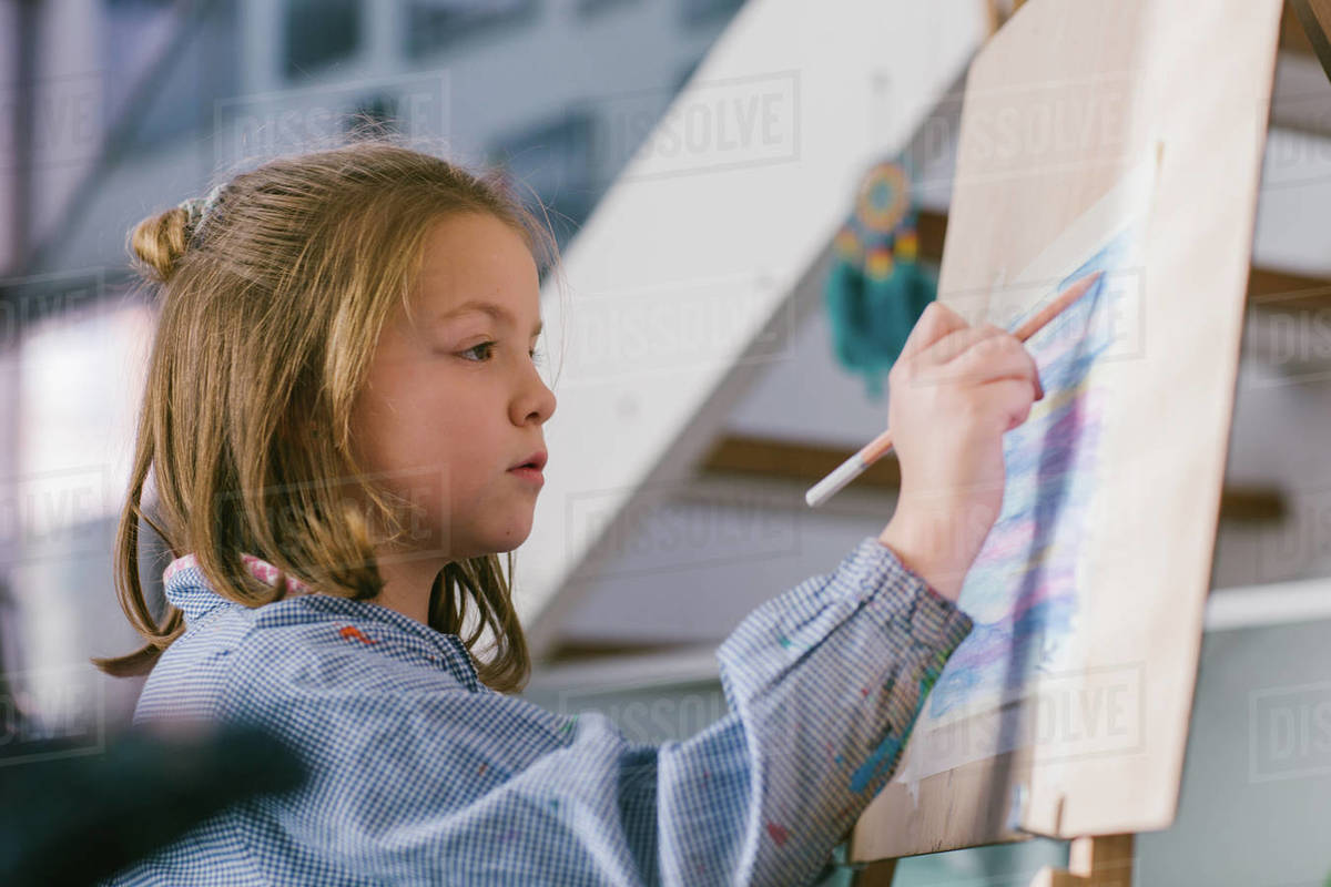 Child drawing on canvas - Royalty-free Stock Photo | Dissolve