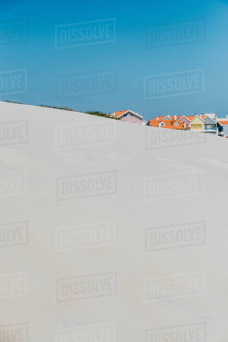 Colorful buildings and sandy beach in sunny day - Royalty-free Stock ...