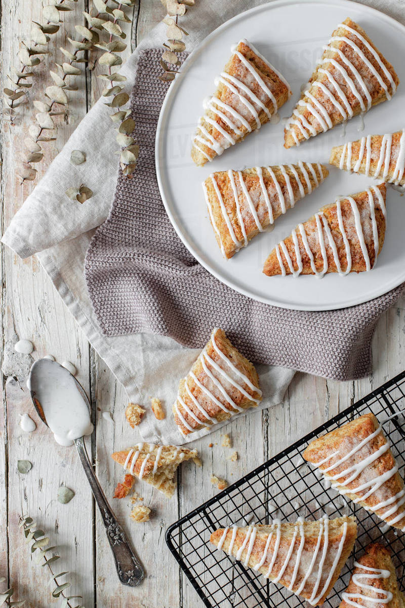 Top view of tasty sweet homemade triangle scones decorated with sugar ...
